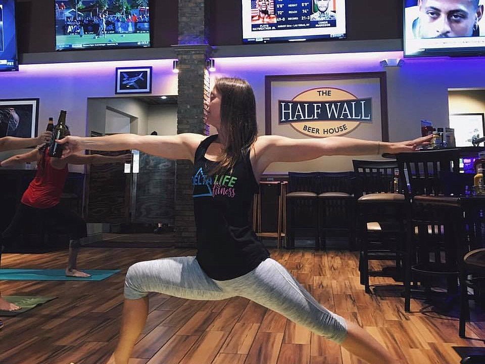 Delta Life Fitness hosts beer yoga class at Half Wall in Port Orange ...