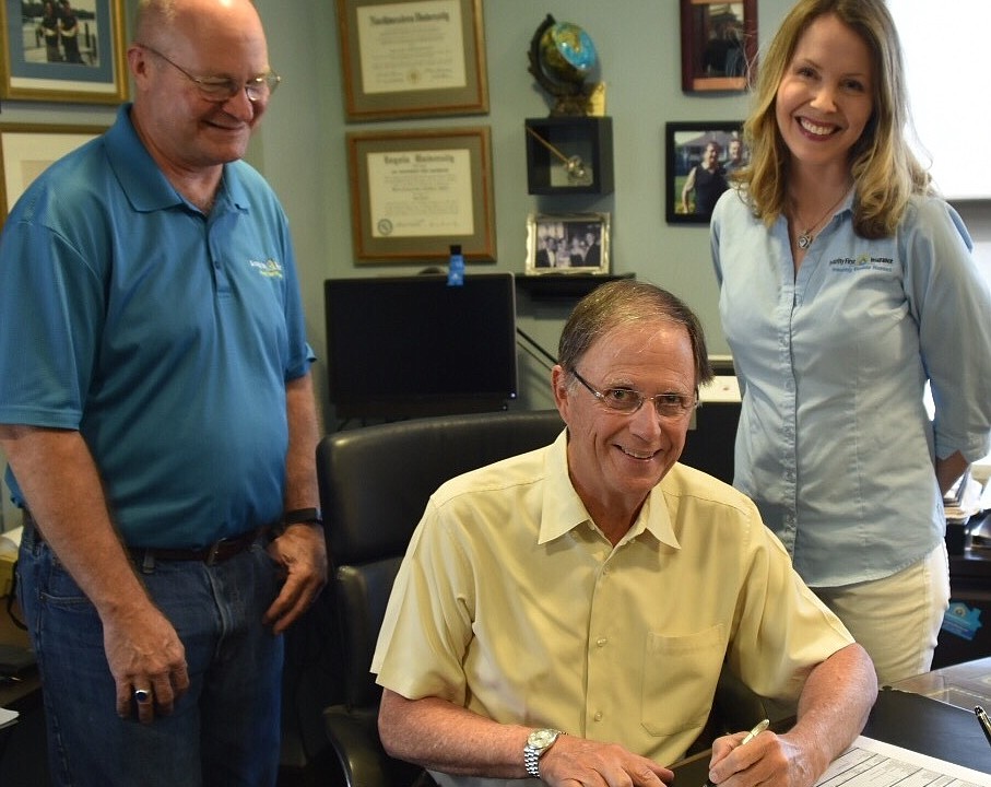 Security First officially closes on land for new headquarters ...