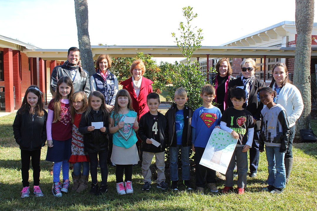Osceola Elementary receives new holly tree | Observer Local News | Palm ...