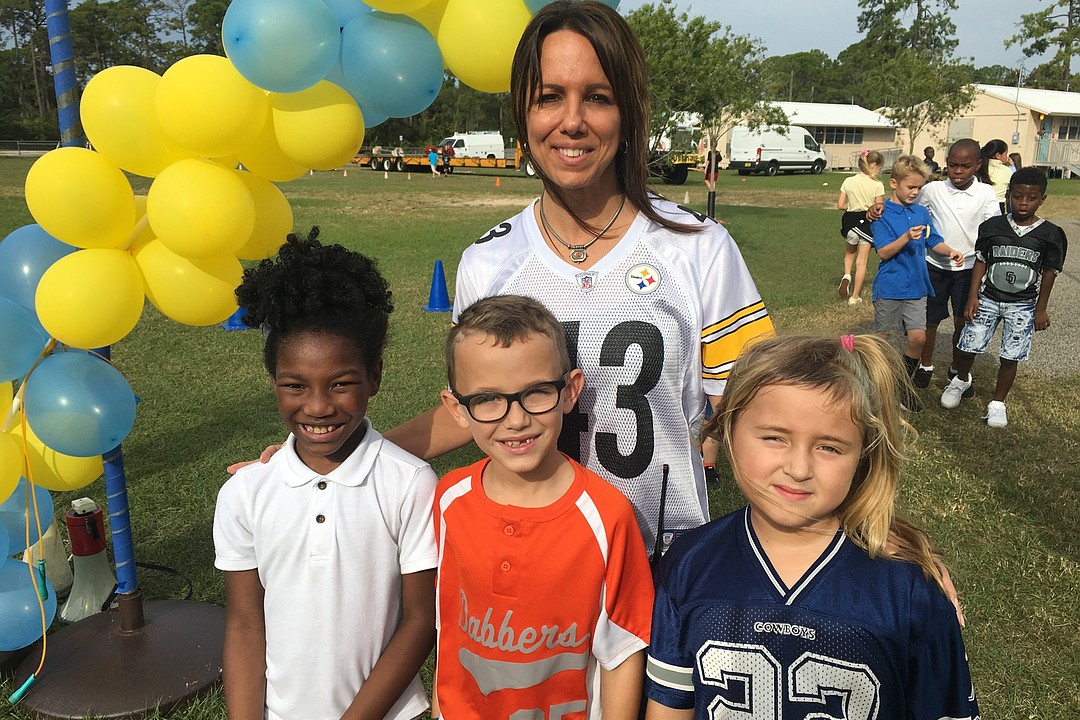 Spruce Creek Elementary holds walk-a-thon to raise funds for a shaded ...
