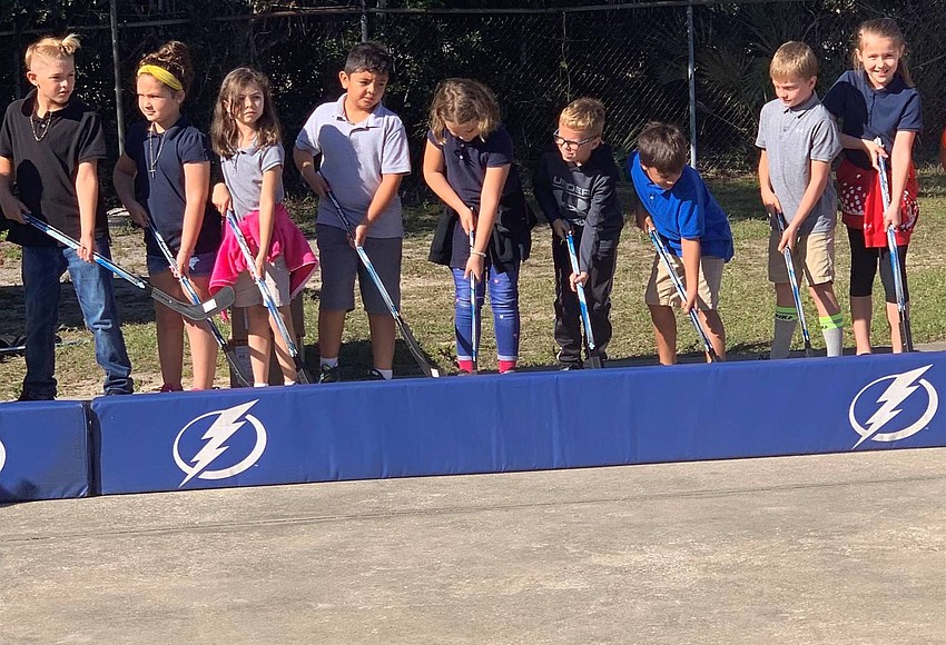 Hockey team visits Port Orange Elementary | Observer Local News | Palm ...