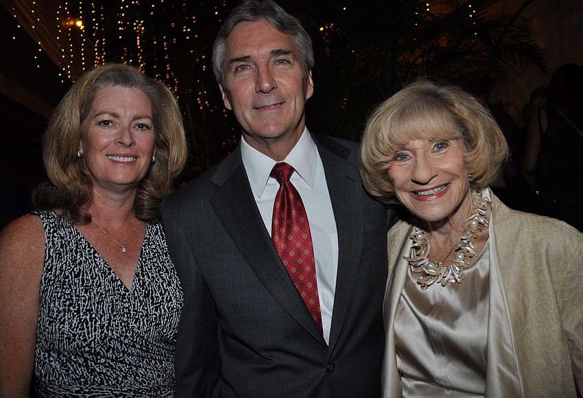 Your Observer | Photo - Julie and Phil Delaney with Flori Roberts