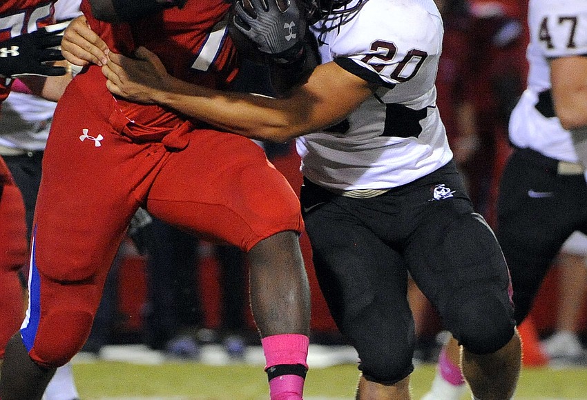 Your Observer | Photo - Sophomore linebacker Marcus Balliette tries to ...