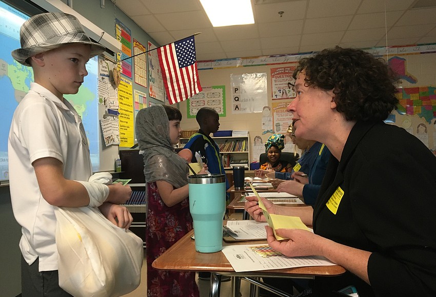 Business Observer | Photo - Brayden Cook and parent Renee Simms. Photo ...