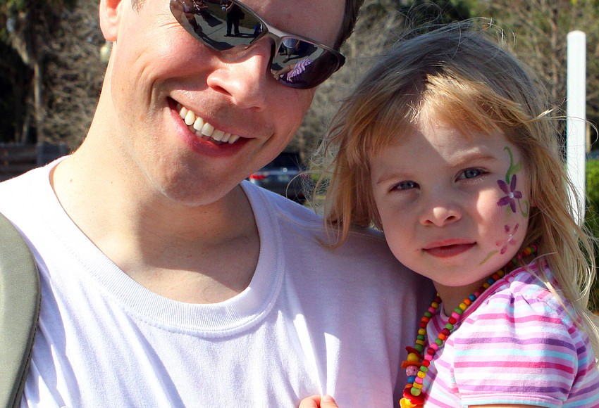 Your Observer | Photo - Christopher Pinckney with his daughter Zora, 2.