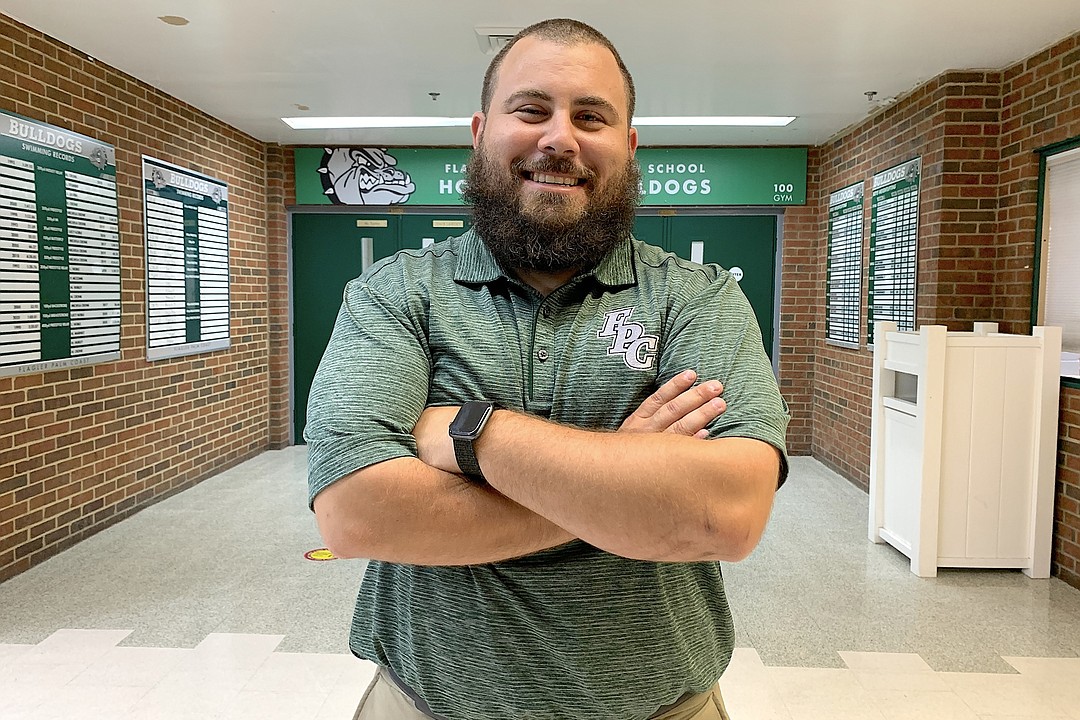 Robert Paxia hired to replace Travis Roland as head football coach at ...