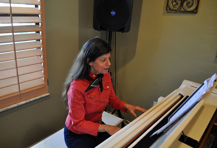 Your Observer | Photo - Barbara Rothman played the piano.