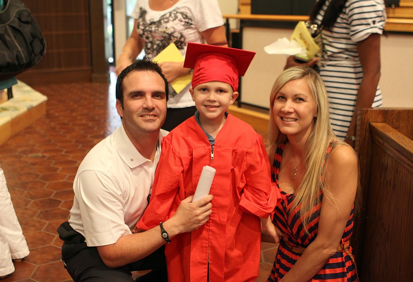 Your Observer | Photo - Aiden Oâ€™Callaghan, 5, with his parents, Gary ...