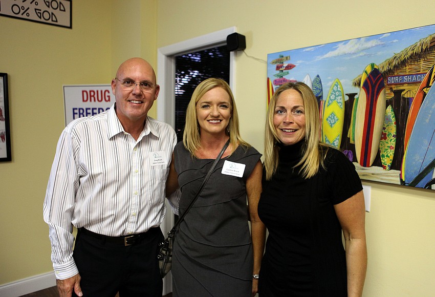 Your Observer | Photo - Greg and Cynthia Brock with Dr. Jennifer Norbits