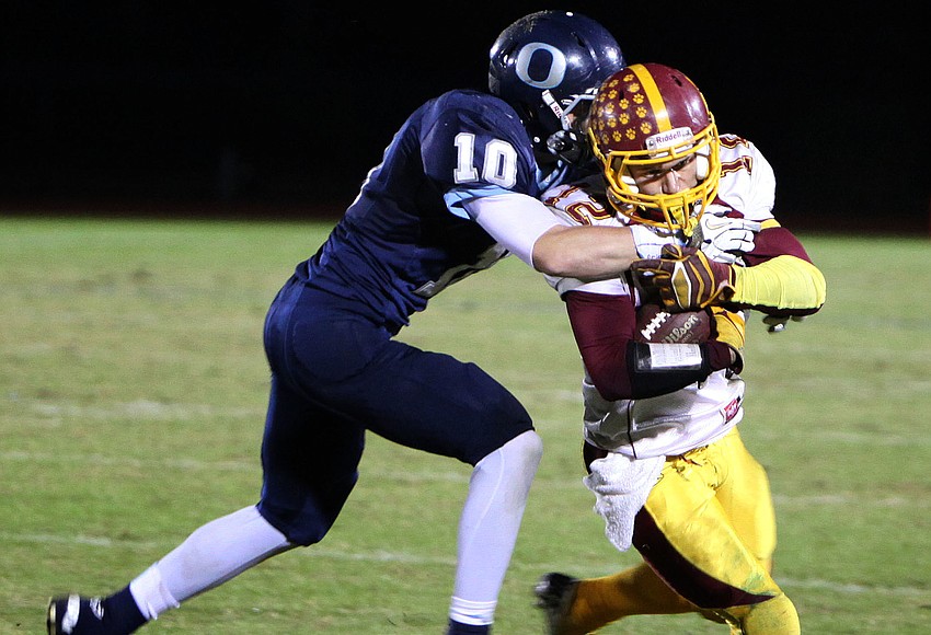 Your Observer | Photo - Tyler Dietrich, No. 10, attempts to tackle ...