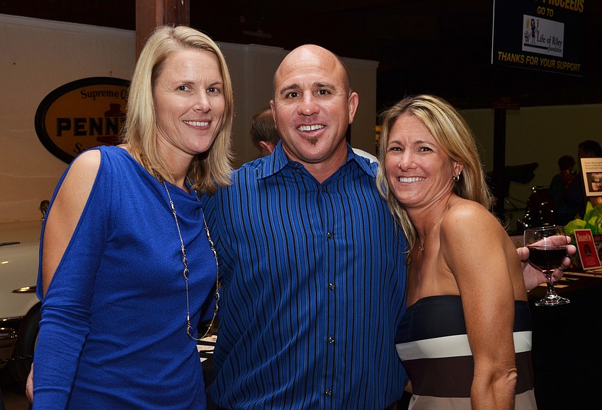 Your Observer | Photo - Sandy and Mike Thirion with Angela Flaherty