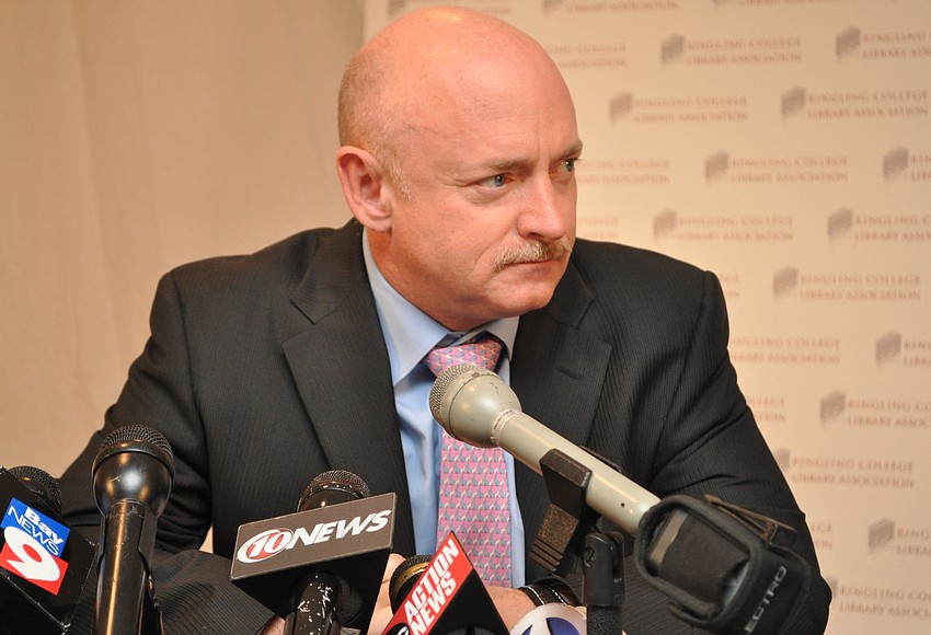 Capt. Mark Kelly speaks about background and background checks | Your ...