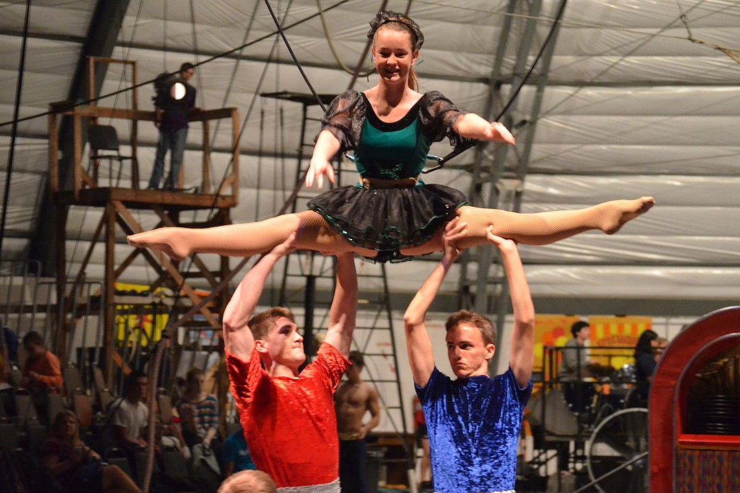Highlights: High-flying daredevil children swing into the center ring ...