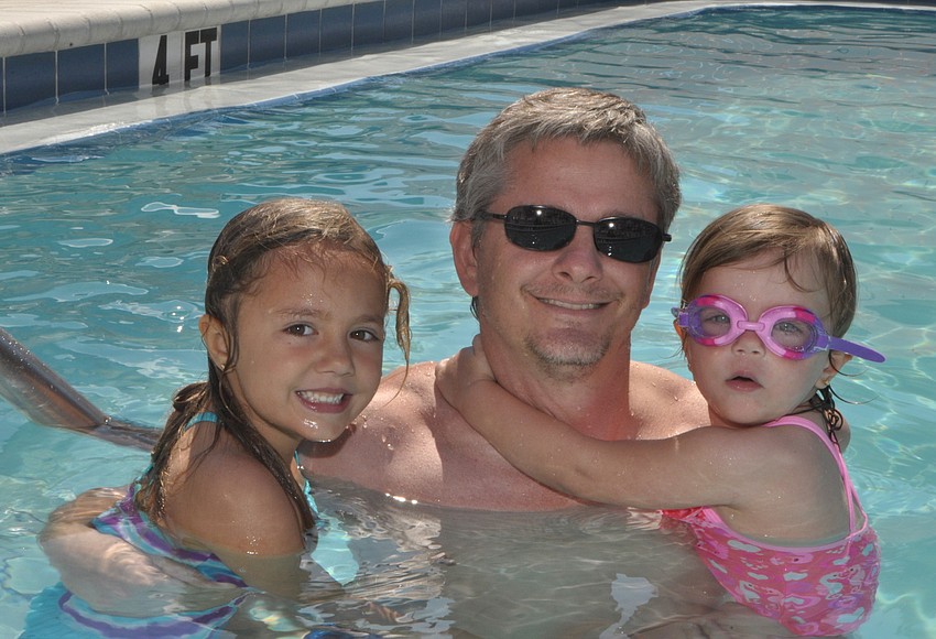 Your Observer | Photo - John Buckley with daughters Layla, 5, and Amelia, 2