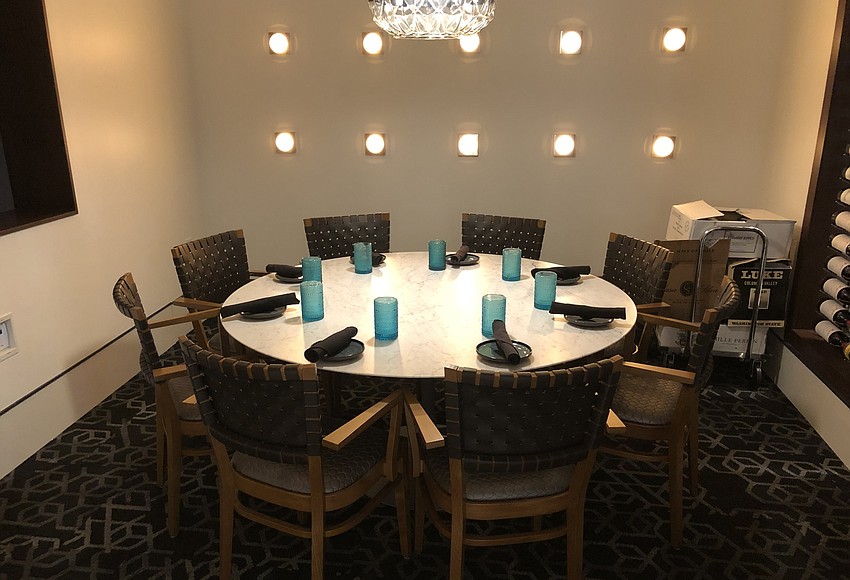Jax Daily Record| Photo - The eight-seat private dining area at M Brothers.