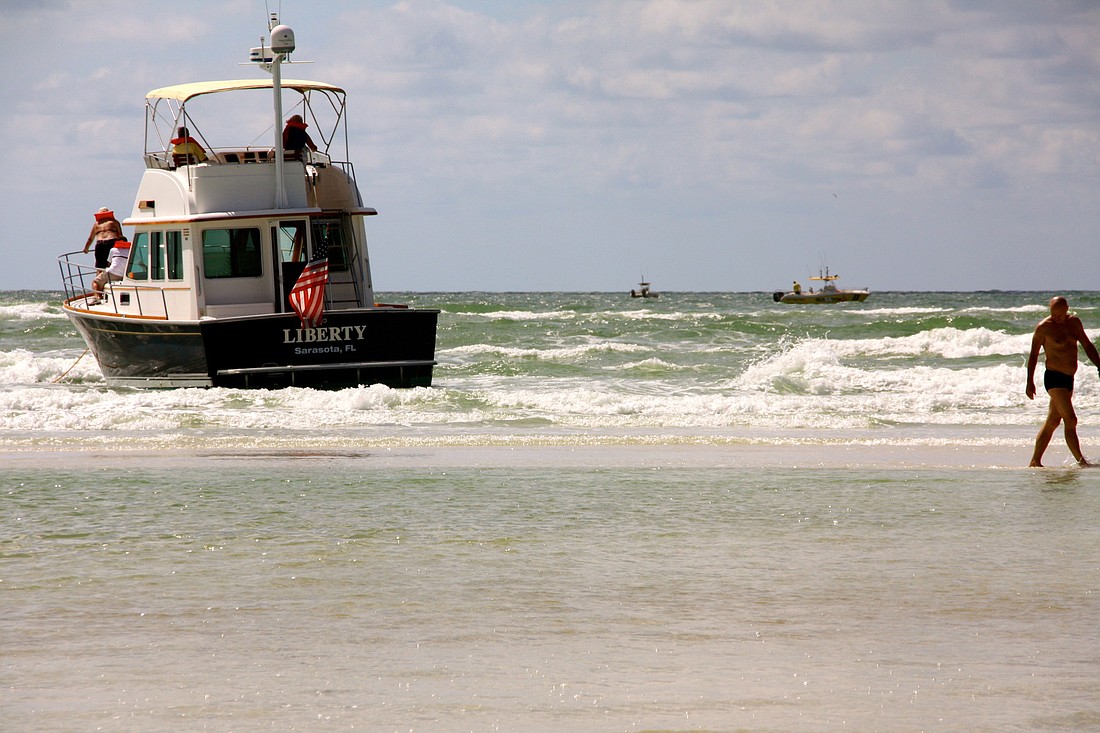 Your Observer | Photo - A 40-foot boat ran aground at the north end of ...