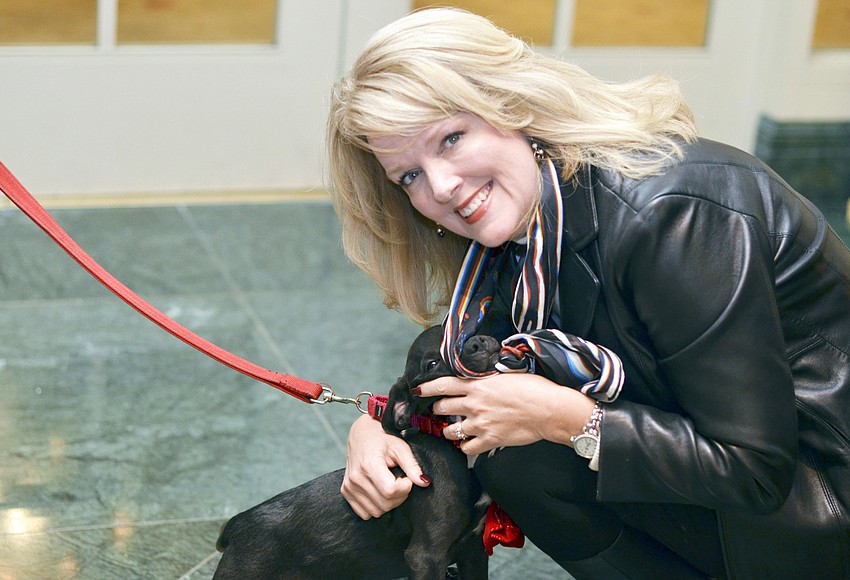 Your Observer | Photo - Deborah Vaughan gets puppy kisses from Teddy ...