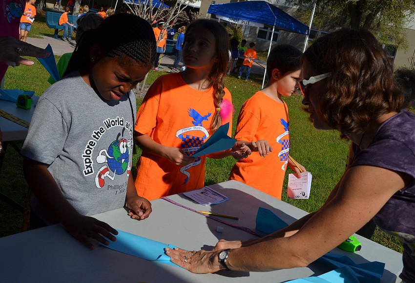 Your Observer | Photo - Jamiyah Johnson learns how to fold her plan ...