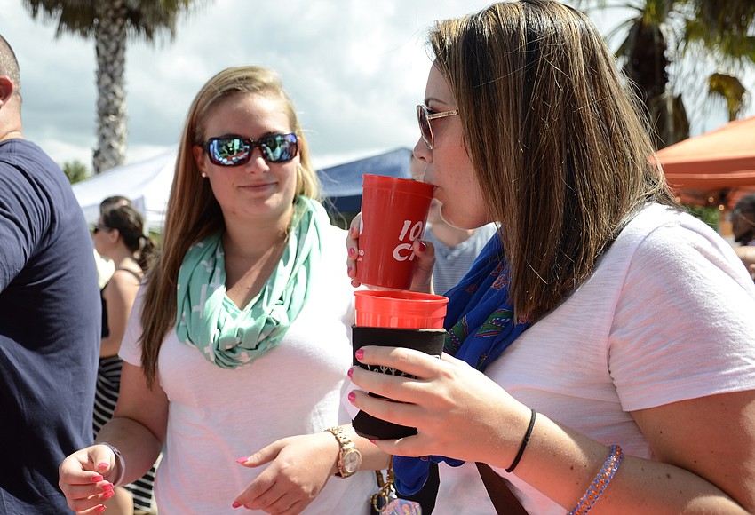 Your Observer | Photo - Sara Hien and Danielle Frey taste each other's ...