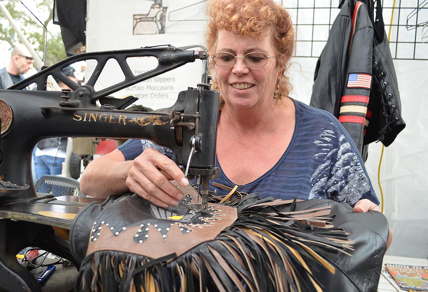 Your Observer | Photo - Eileen Ceded known as "The Slipper Lady" embroiders a logo to the back ...