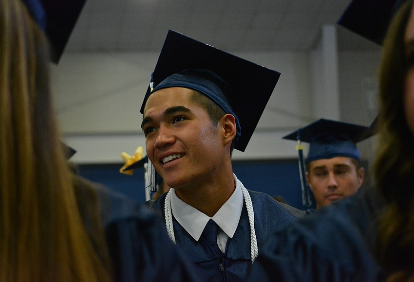 Your Observer | Photo - Owen Han smiles as the ceremony begins.