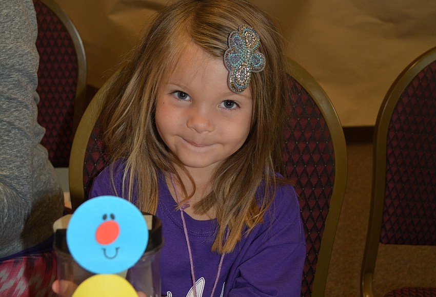 Your Observer | Photo - Finley Martin, 4, shows off her lightning bug.