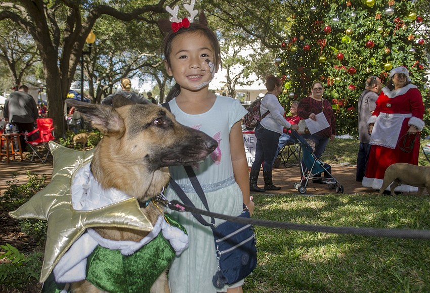 Your Observer | Photo - Arden Lee poses with her dog Miko.