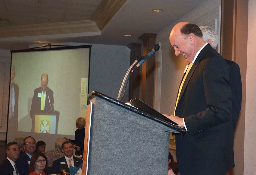 Your Observer | Photo - Mark Pritchett welcomes attendees.
