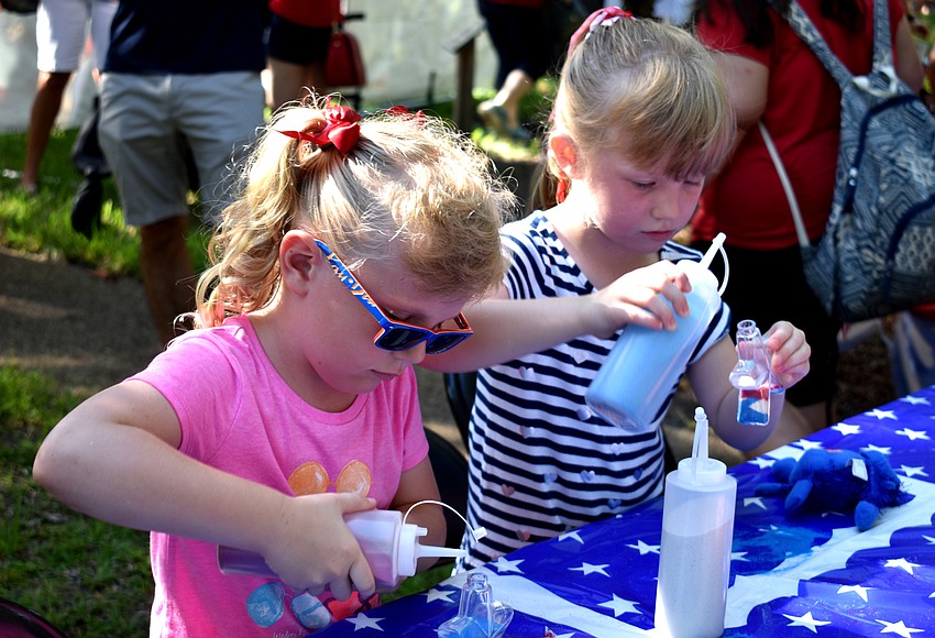 Your Observer | Photo - Katie and Emily Stansbury make sand art after ...
