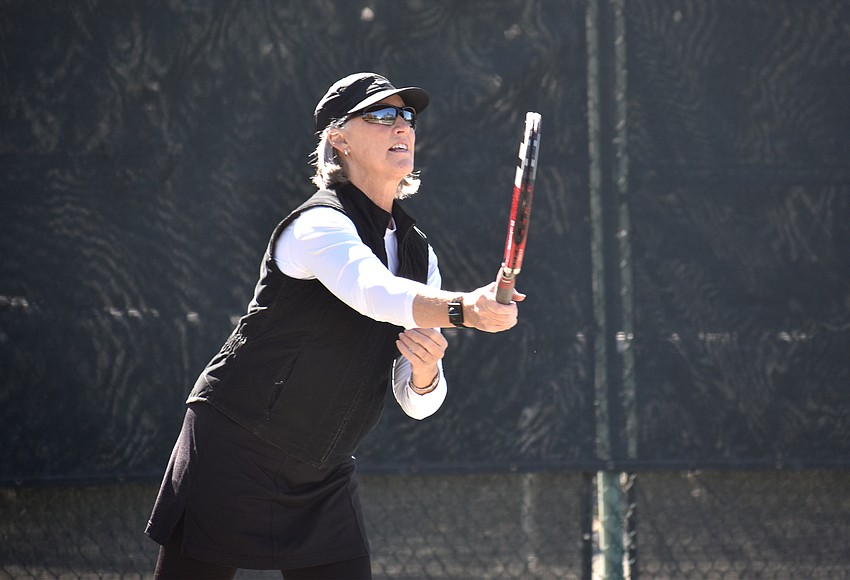 Your Observer | Photo - Jan Withers hits the ball during a preliminary ...