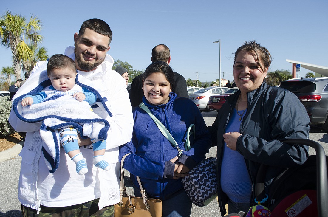 Your Observer | Photo - Eddy and Eddy Jr. Navarro, Adriana Maldonado ...
