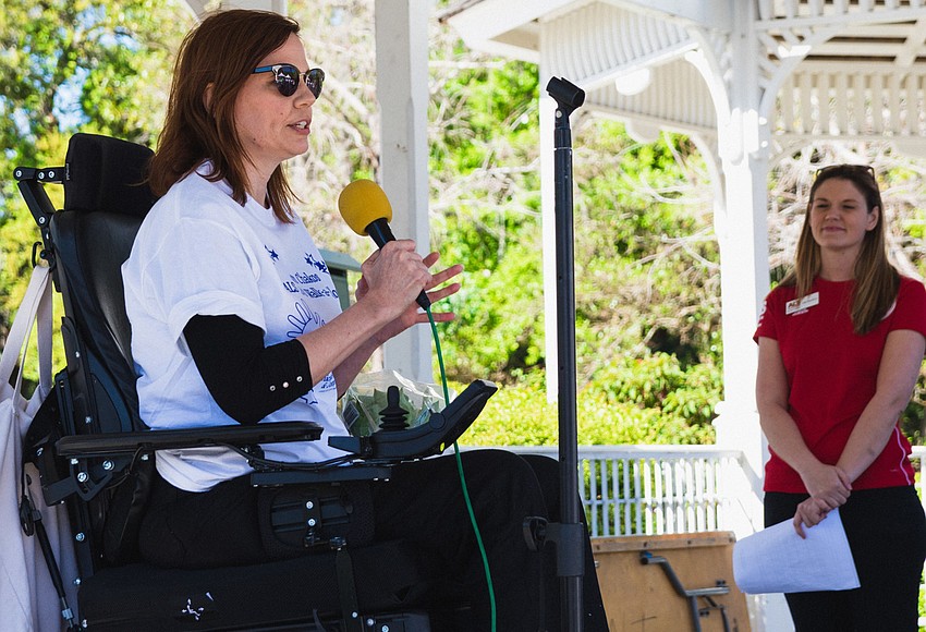 Your Observer | Photo - Anne Chakos speaks during the opening ceremony.