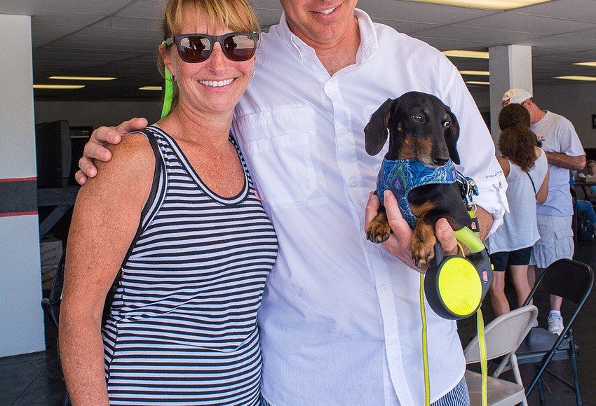 Your Observer | Photo - Mary and Bryan Scheible with their pooch Molly.