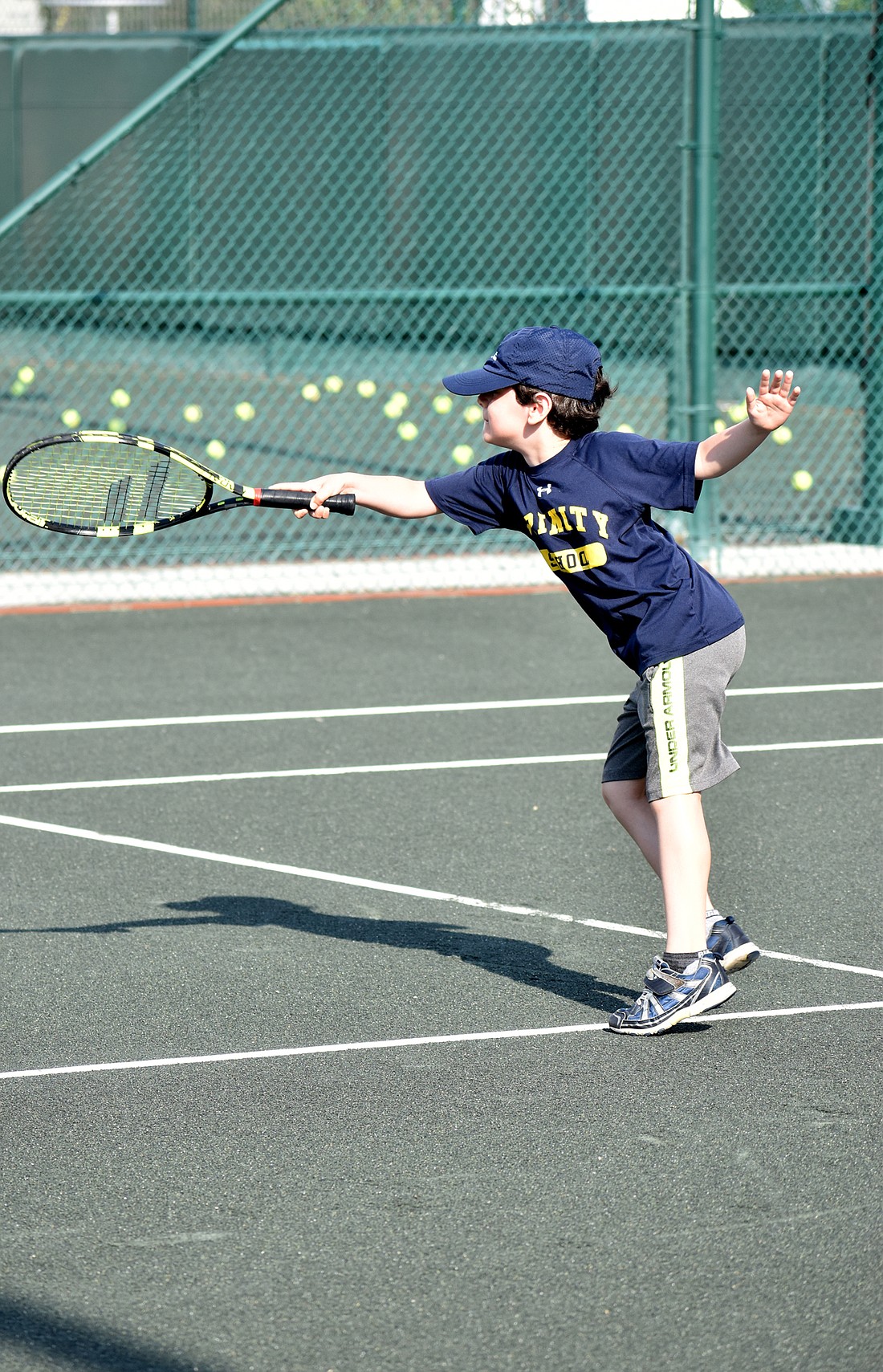 Your Observer | Photo - Teddy Brody hits the ball during camp at the ...
