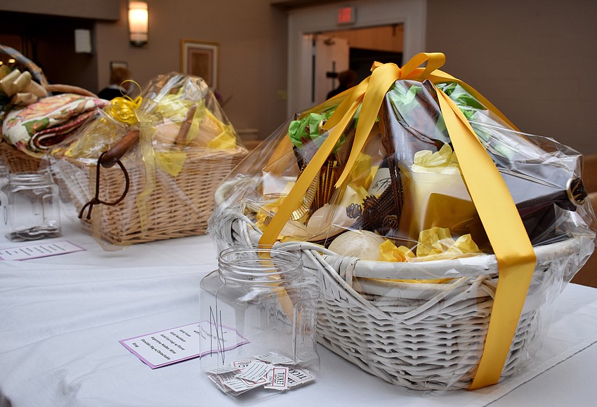 Your Observer | Photo - Raffle baskets were on display as attendees ...