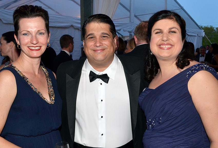 Your Observer | Photo - Justine Amdur with Eric and Christine Robinson