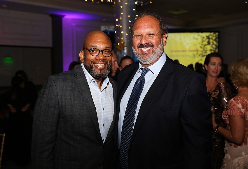 Your Observer | Photo - Trevor Harvey and President and CEO Philip Tavill