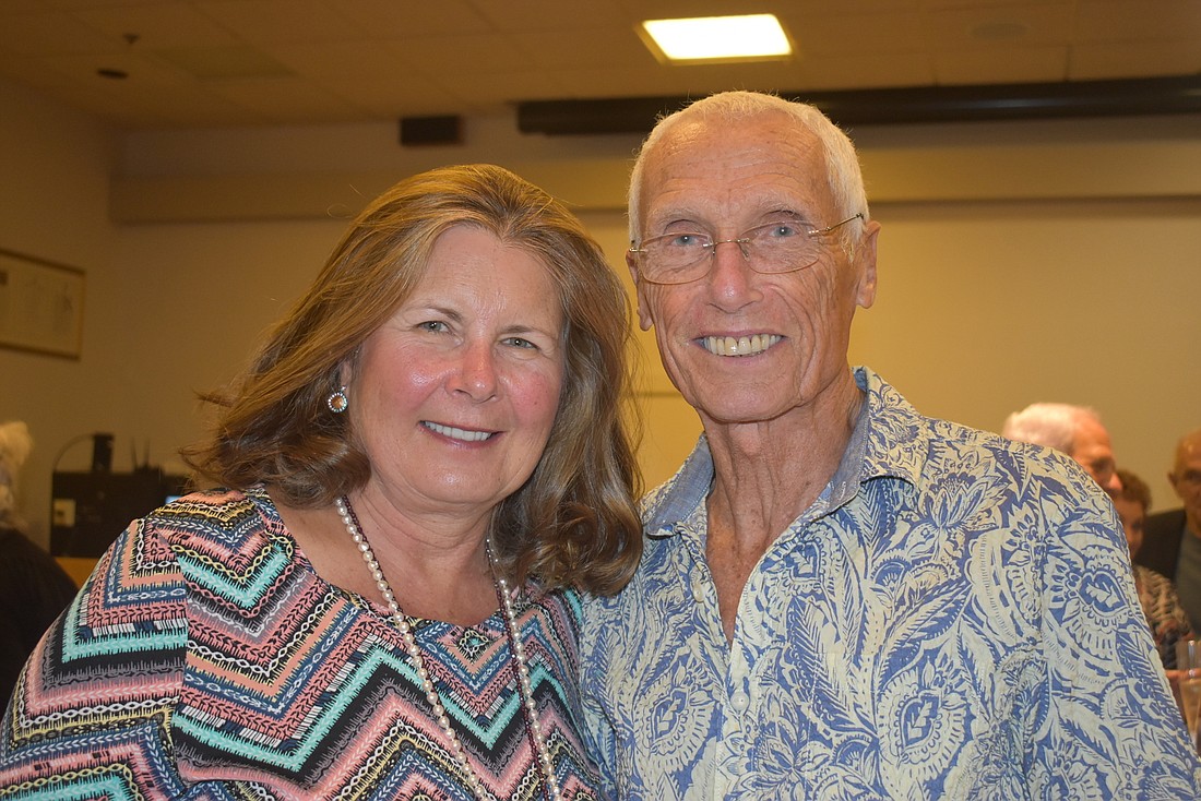 Your Observer | Photo - Nancy and David Freund wait for food and drink.