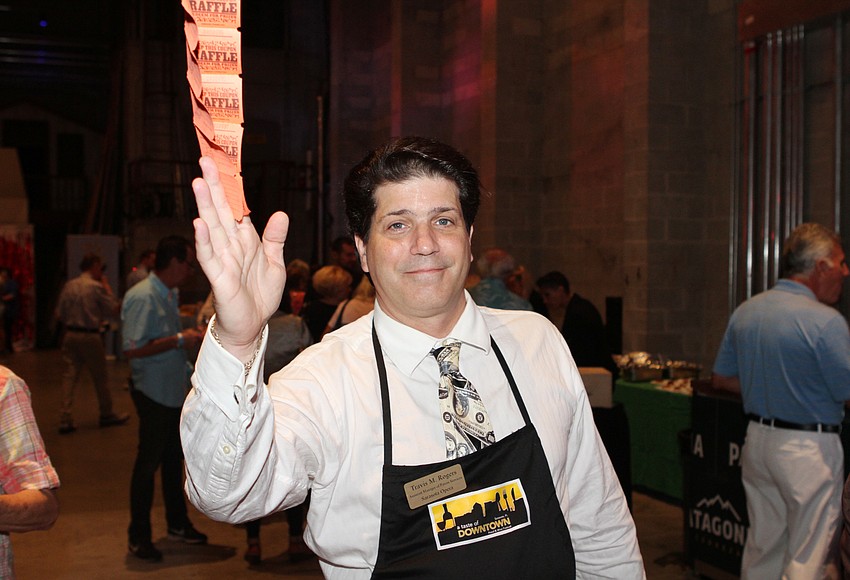 Your Observer | Photo - Travis Rogers passed out raffle tickets