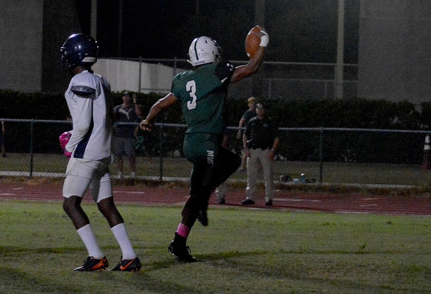 Your Observer | Photo - Senior running back Isaiah Harrison celebrates ...