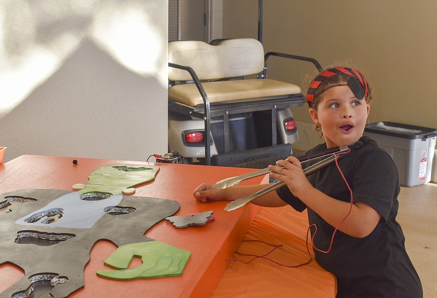Your Observer | Photo - Jazzibella Matos is excited during her game of ...