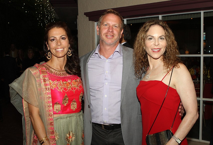 Your Observer | Photo - Andrea and Aaron Rutsky with Ally Small