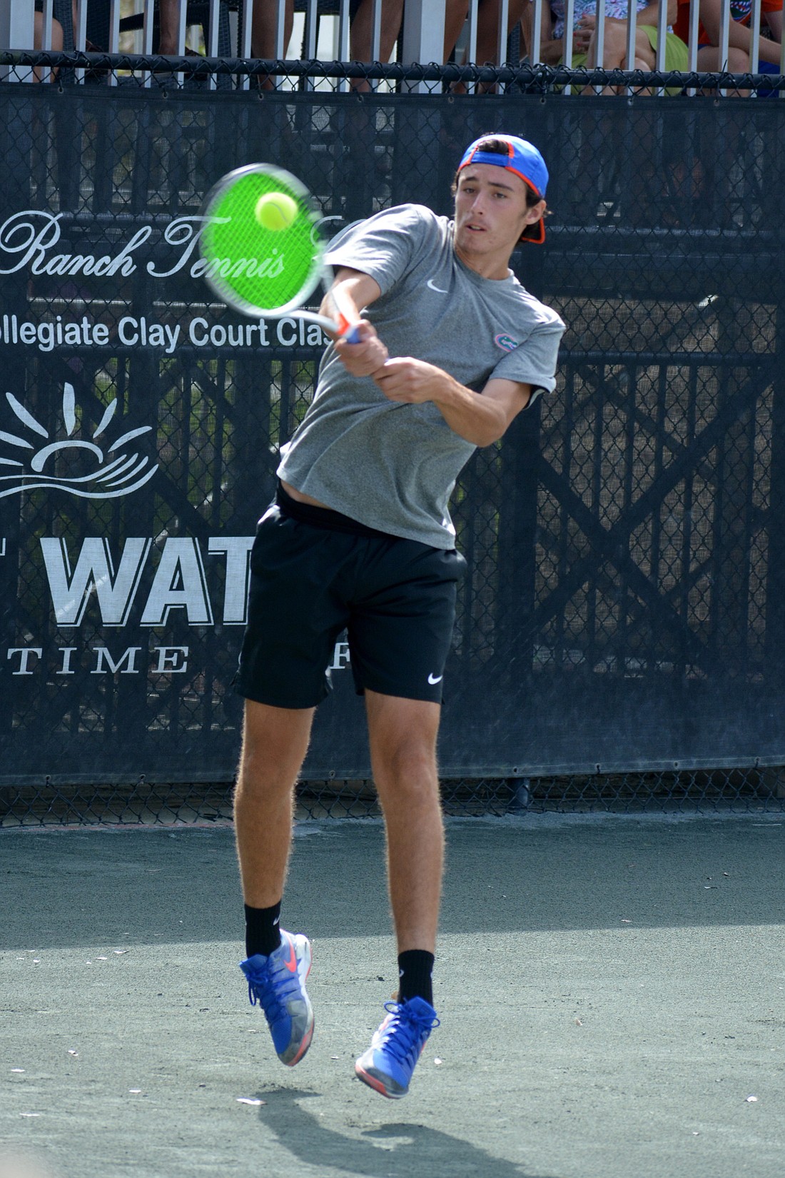 Your Observer | Photo - Florida junior Josh Goodger returns a shot from ...
