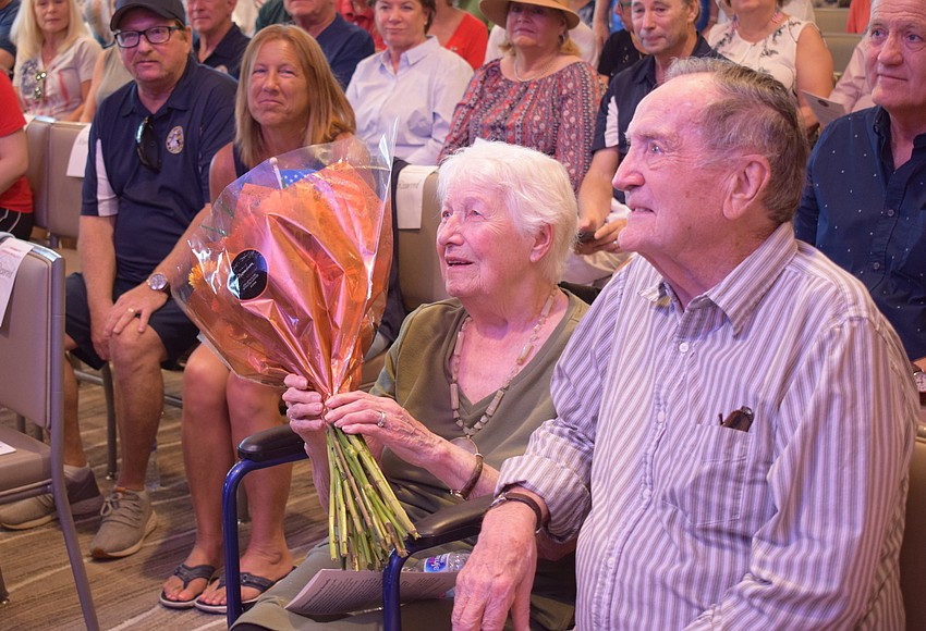 Your Observer | Photo - Rose Bauer holds flowers that were given to her ...