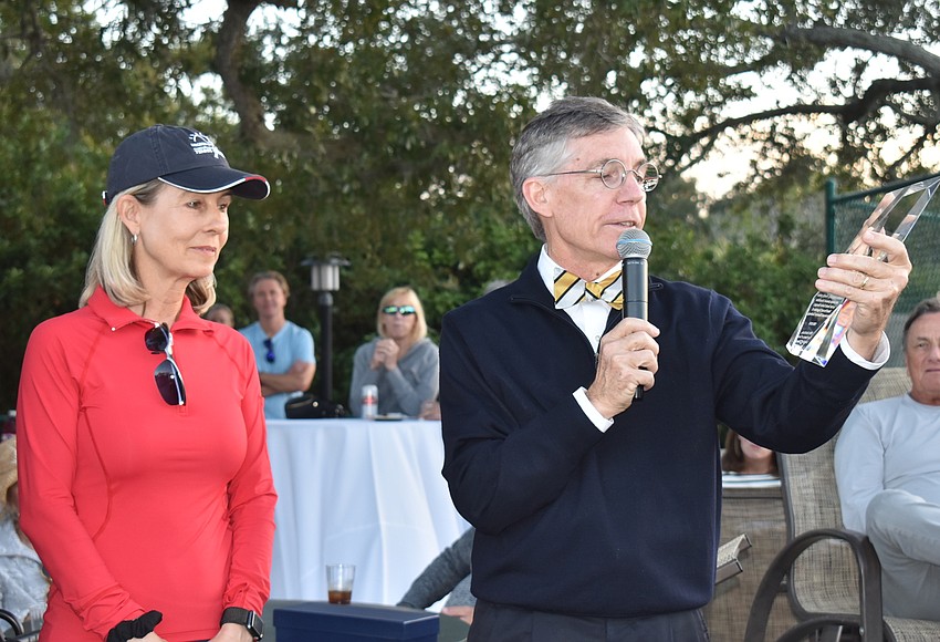 Your Observer | Photo - Matt Walsh presents Kay Thayer with her award.