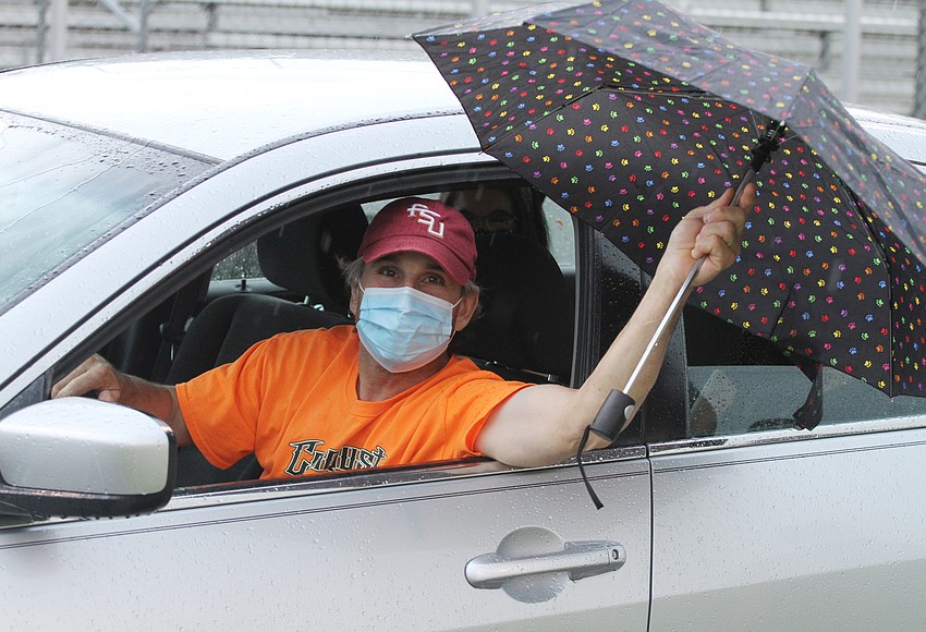 Your Observer | Photo - Daniel Chico cheered on his daughter Jordyn.