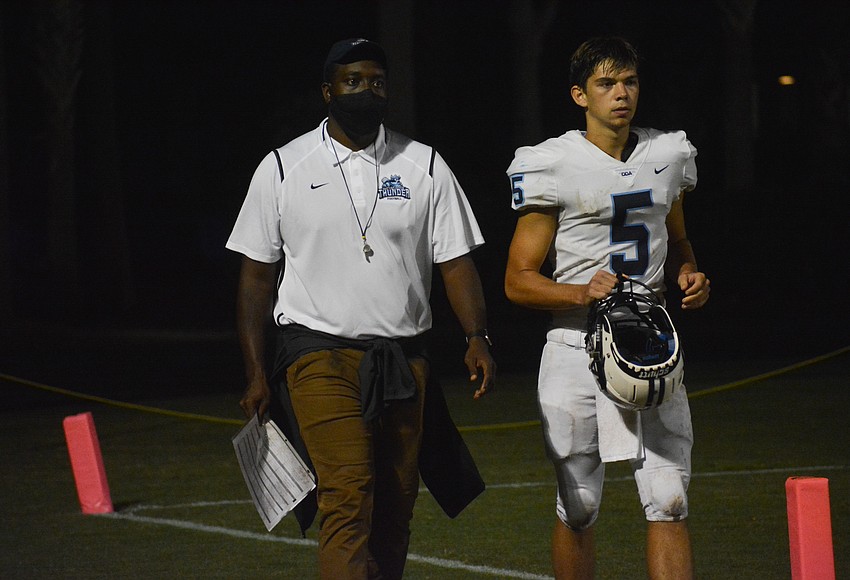 Your Observer | Photo - ODA Coach K.B. Belton chats with quarterback ...
