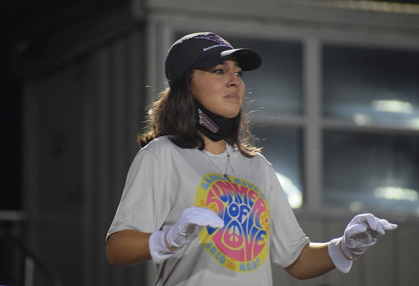 Your Observer | Photo - Allison Guzman, a senior and drum major, gets ...