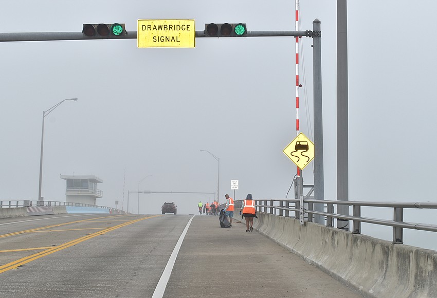 Your Observer | Photo - Members head over New Pass Bridge.