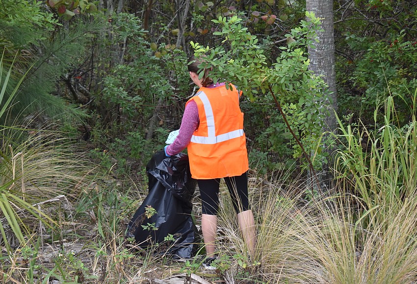 Your Observer | Photo - Kelli Carter heads into the foliage.